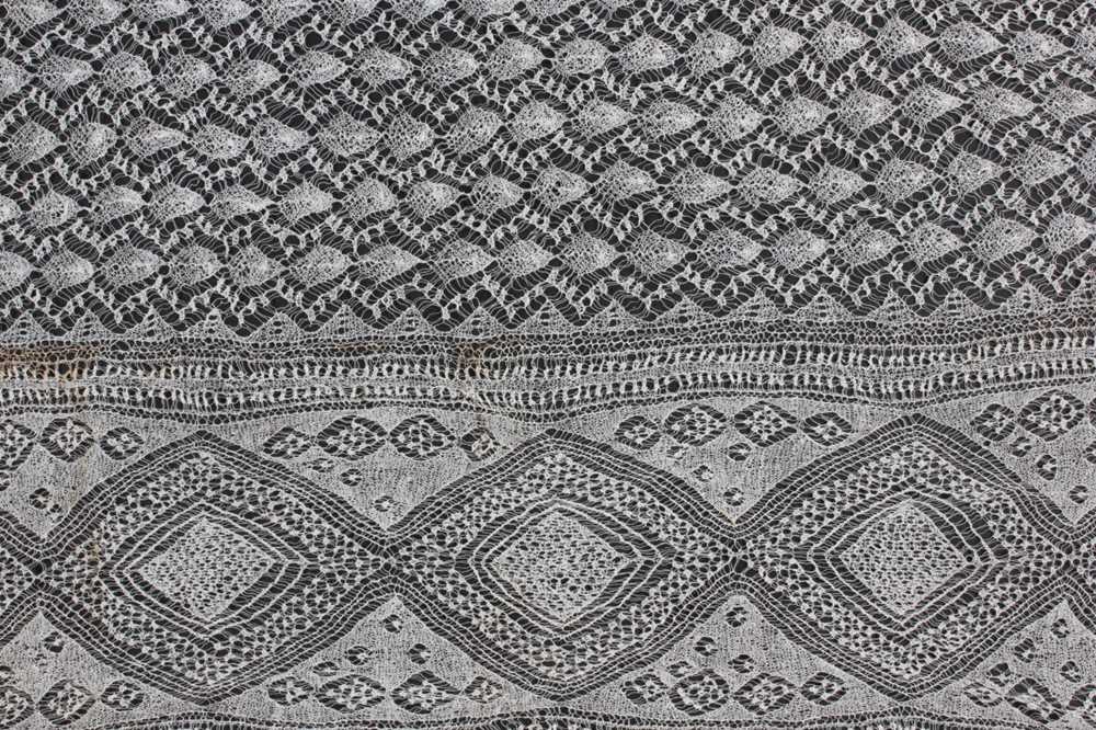Lot 516 - A gossamer-fine knitted cotton Shetland