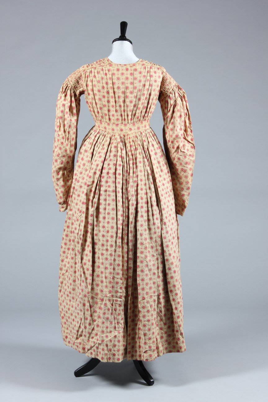 Lot 151 - A printed cotton day dress, late 1830s, the