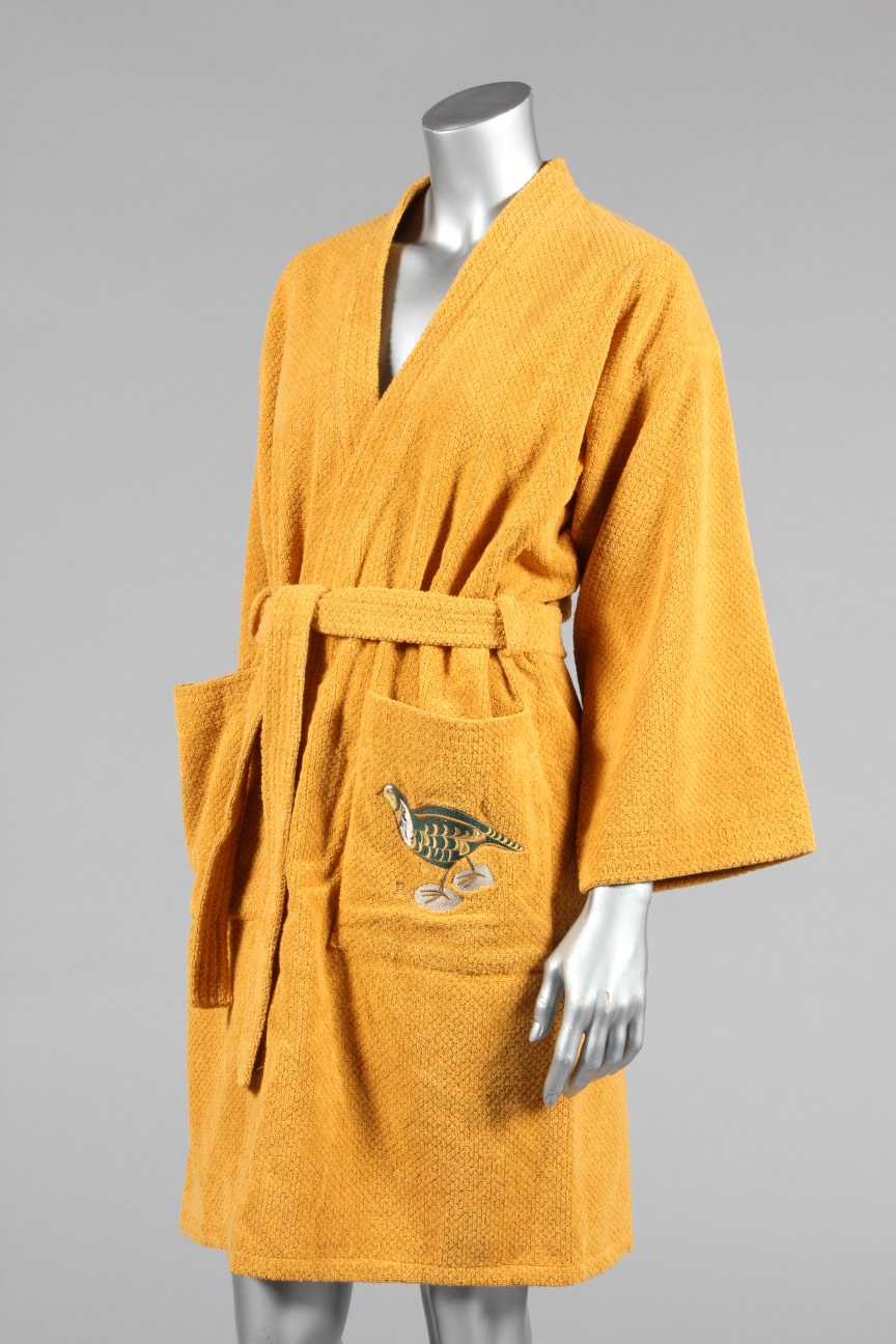 Lot 202 - An Hermès mustard yellow bath robe, 1980s,