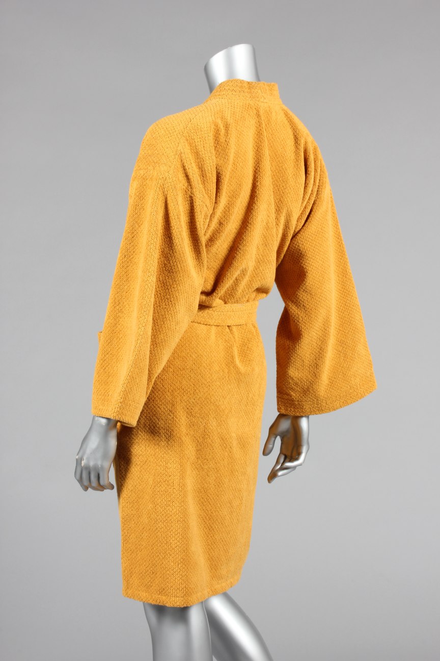 Lot 202 - An Hermès mustard yellow bath robe, 1980s,