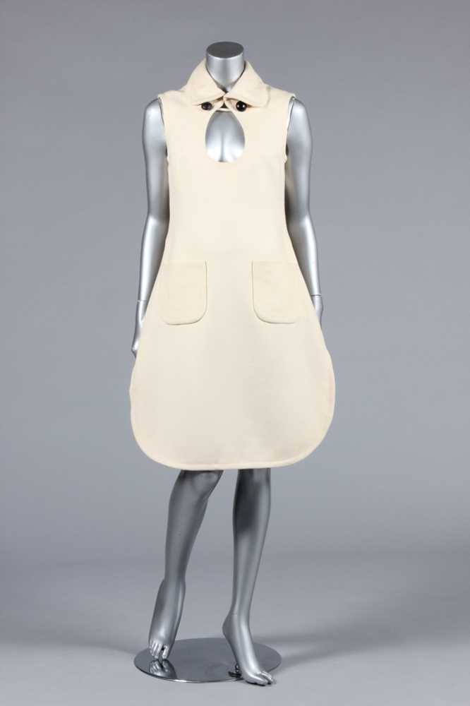 Lot 228 - A Pierre Cardin cream wool tabard-dress,