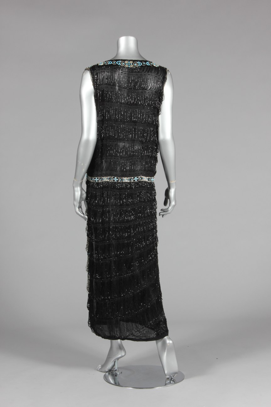 Lot 244 - A good beaded flapper dress, circa 1922, the