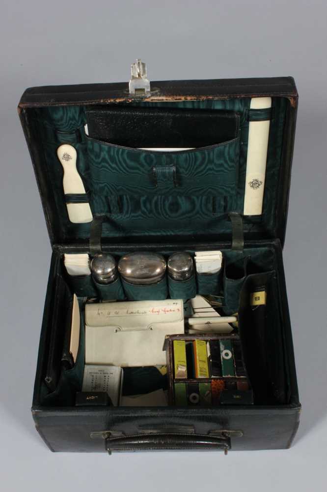 Lot 478 - A group of leather cases, dressing set and