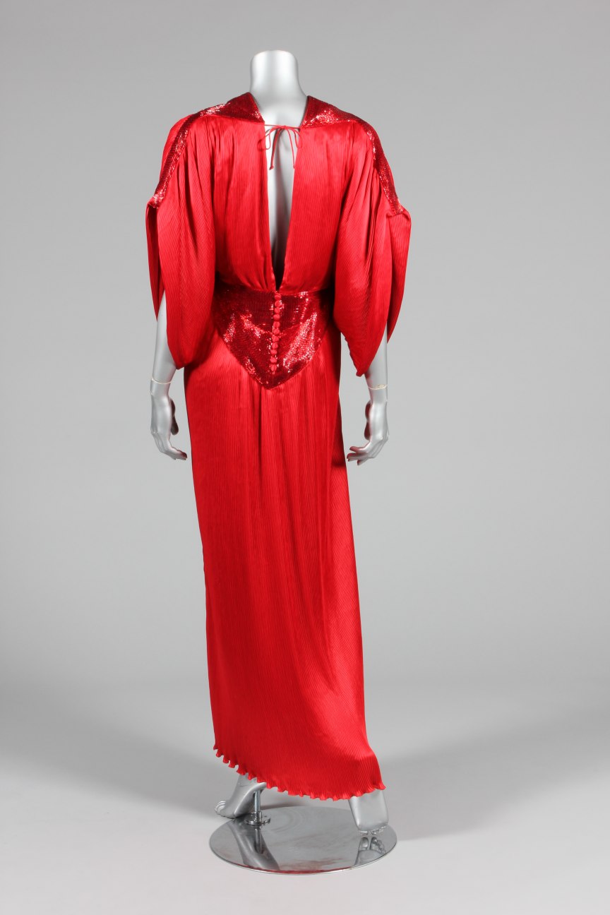 Lot 12 - A Yuki red pleated evening gown, probably