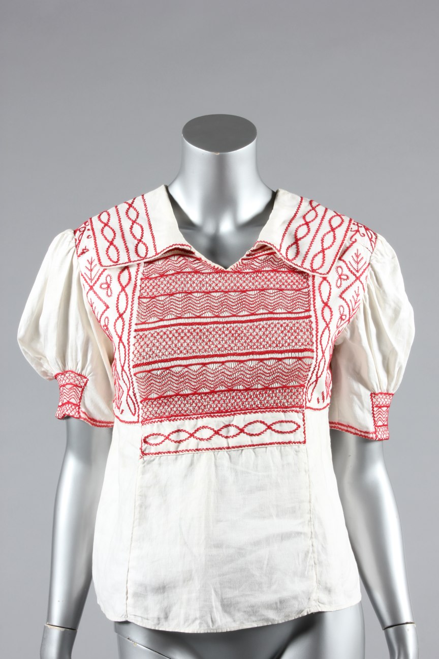 Lot 49 - An embroidered farmer's smock, circa 1900,