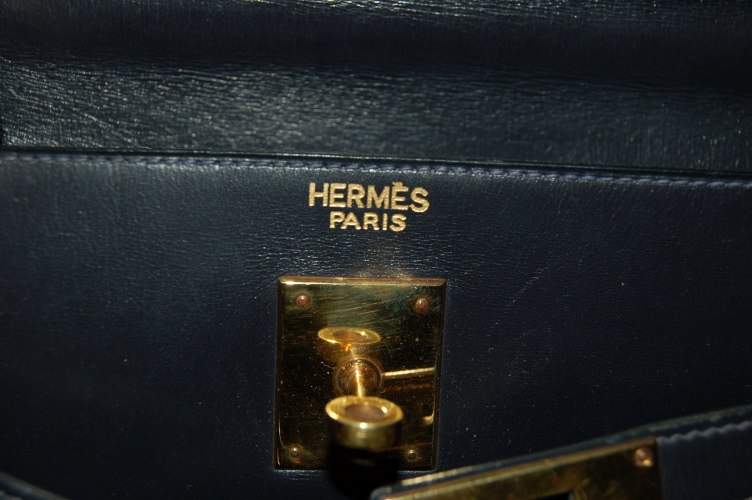 Lot 296 - An Hermès dark blue/purple box calf leather