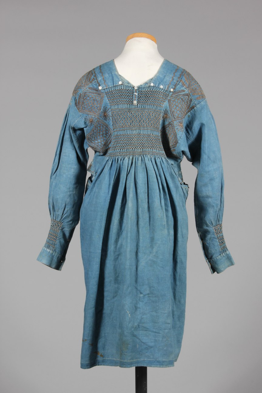 Lot 9 - A blue calico farmer's smock, circa 1900,