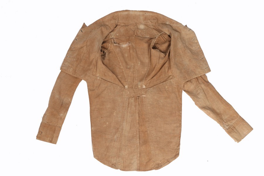 Lot 94 - A rare young man's nankeen tailcoat, 1815-20,