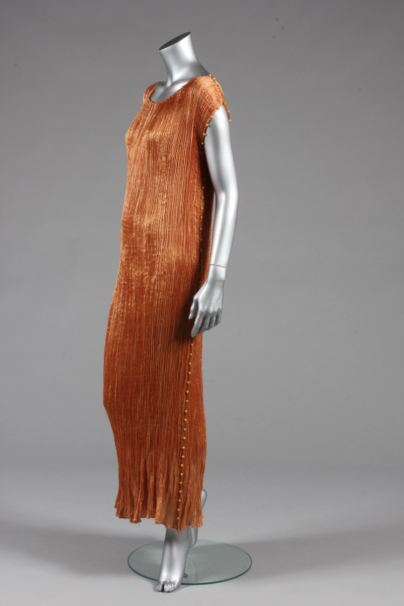 Lot 48 - A Mariano Fortuny copper silk Delphos gown,