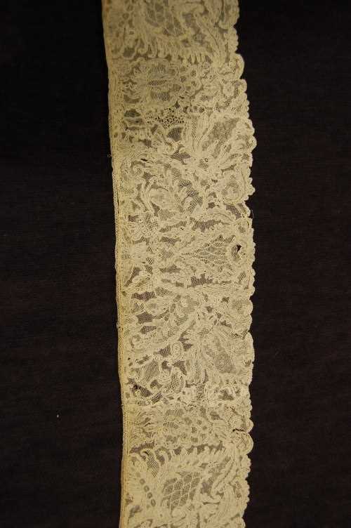 Lot 239 - A rare Flemish needlepoint lace engageant,