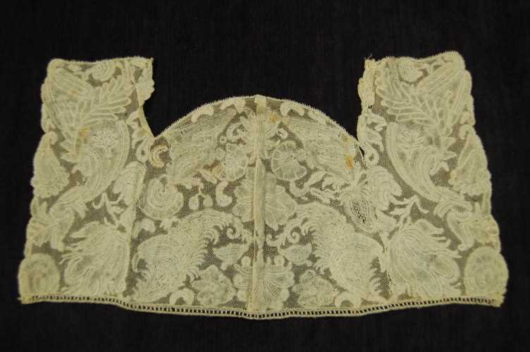 Lot 240 - A Flemish bobbin lace cap back, circa 1730,