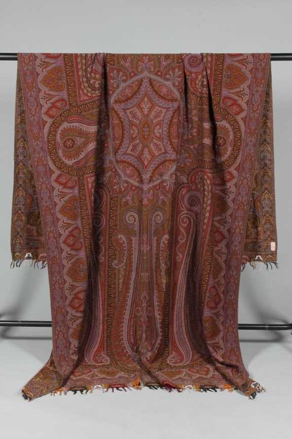 Lot 157 - A woven Paisley design woollen shawl,