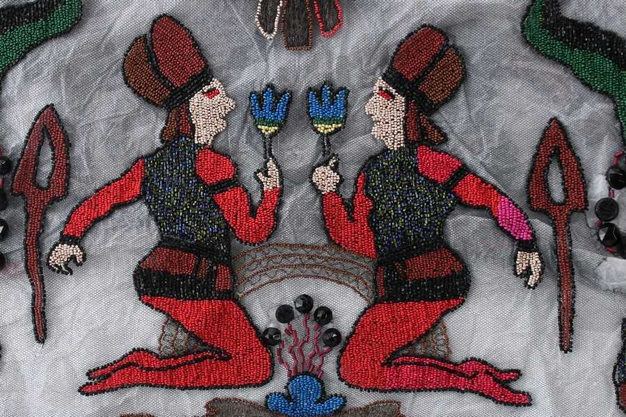 Lot 111 - An interesting tulle tabard beaded with