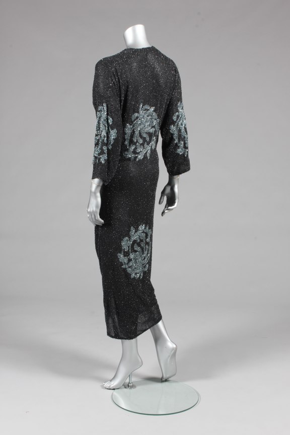 Lot 71 - A beaded opera coat, mid 1920s, the black