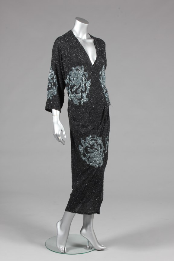 Lot 71 - A beaded opera coat, mid 1920s, the black