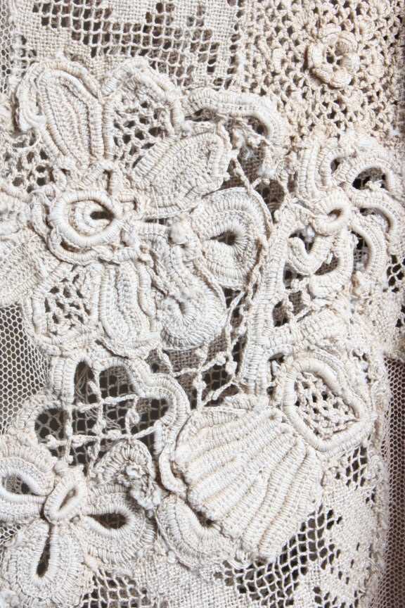 Lot 84 - A 1930s summer gown formed of Edwardian lace,