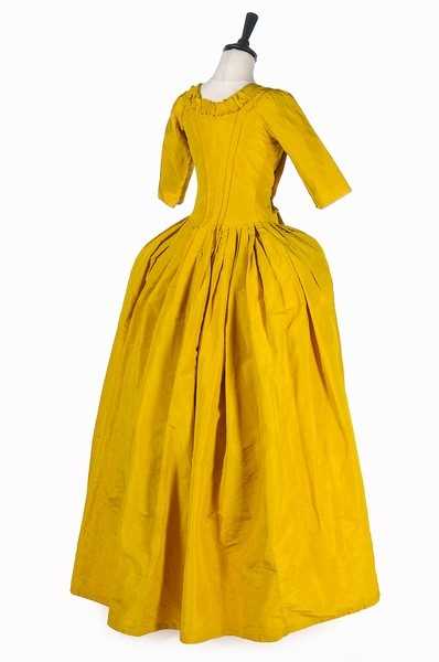 Lot 29 - A brilliant yellow silk open robe l'Anglaise,