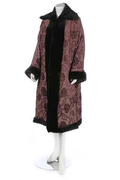 Lot 302 - A reversible opera coat, 1930s, with one