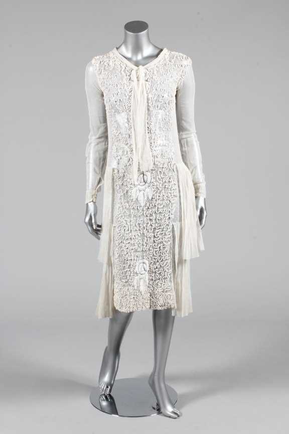 Lot 201 - A lace summer/bridal gown, circa 1923, of