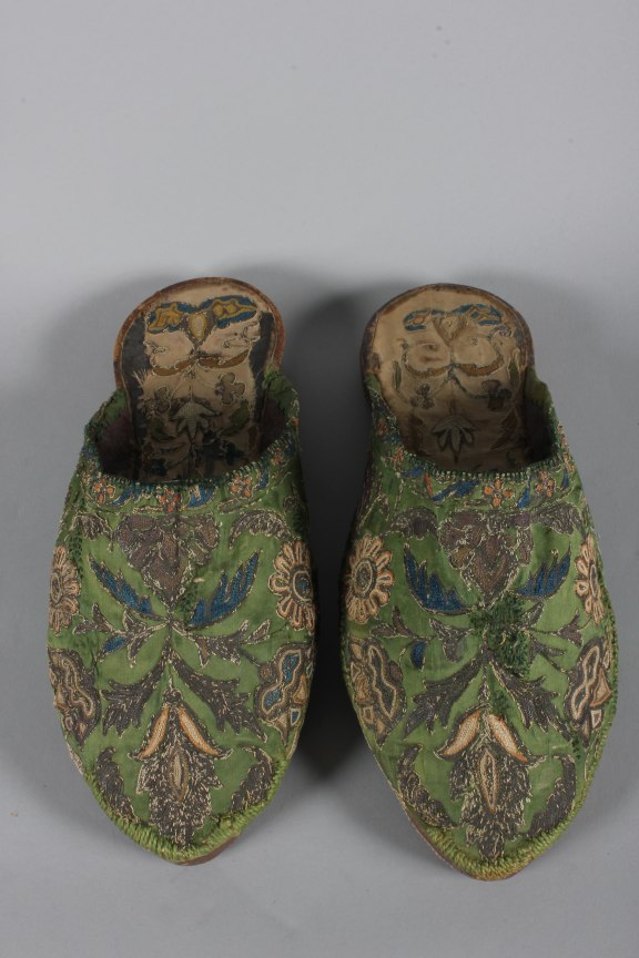 Lot 60 - A pair of embroidered gentlemen's mules,