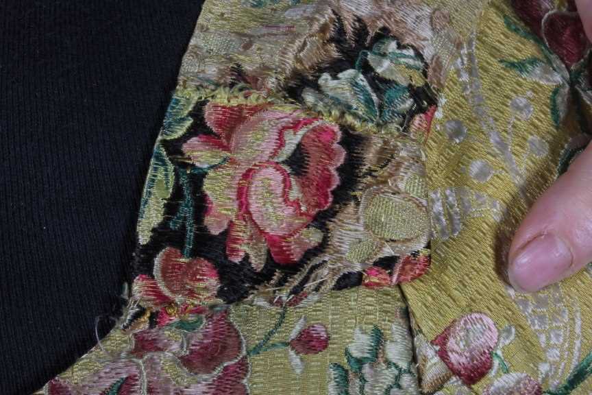 Lot 80 - A brocaded silk robe l'Anglaise, the silk