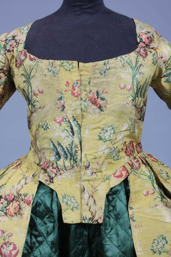 Lot 80 - A brocaded silk robe l'Anglaise, the silk