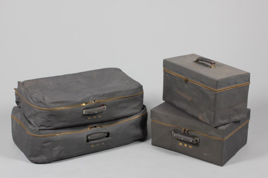 Lot 26 - A suite of powder blue leather luggage,