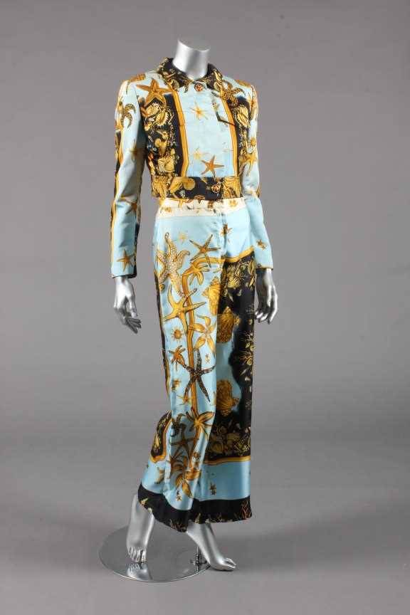 Lot 309 - A Gianni Versace seaside print silk suit,