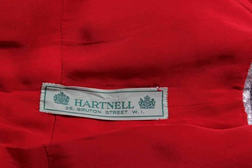 Lot 373 - A Norman Hartnell silver mini-dress, mid