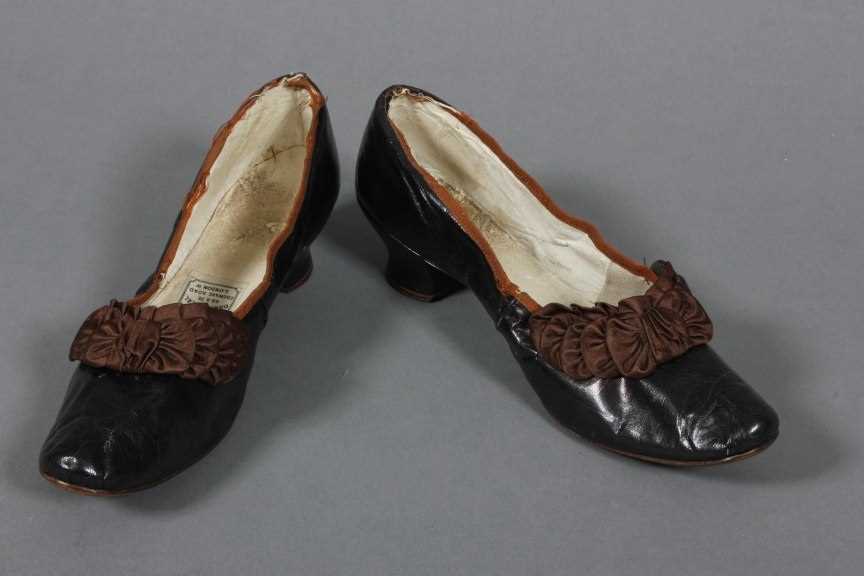 Lot 380 - A pair of Daniel Neal black leather shoes,