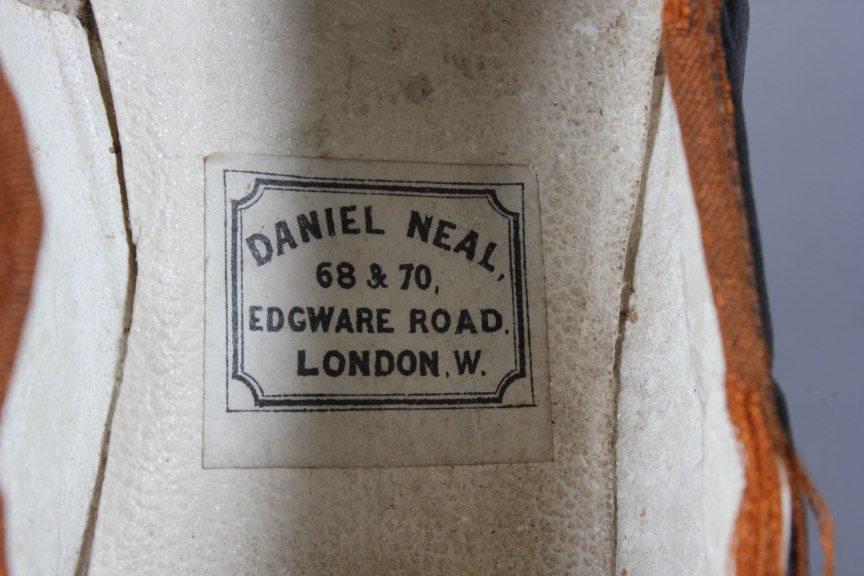 Lot 380 - A pair of Daniel Neal black leather shoes,