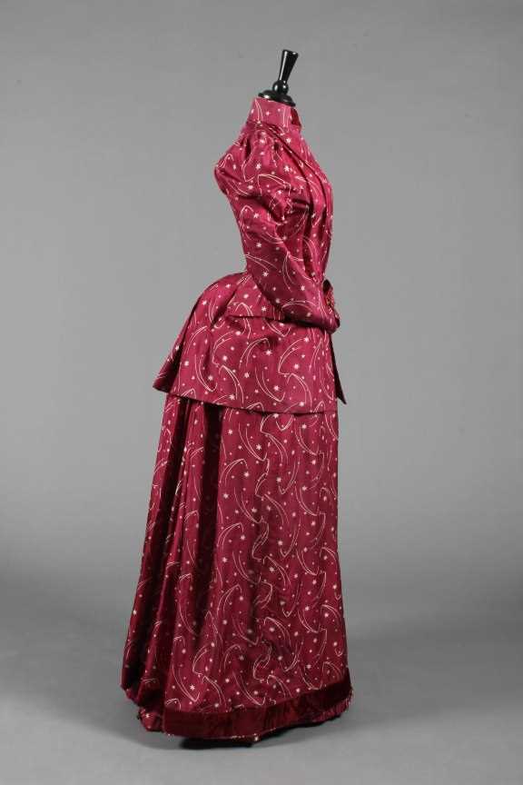 Lot 62 - A printed silk dress, circa 1888-90, the wine