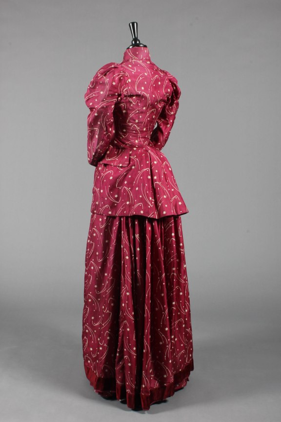 Lot 62 - A printed silk dress, circa 1888-90, the wine