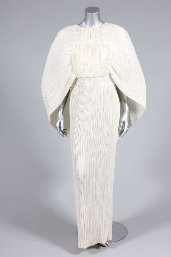 Lot 17 - A Yuki ivory pleated evening gown,