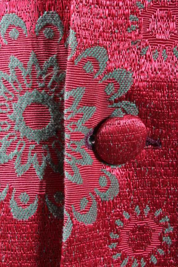 Lot 41 - A John Stephen red damask satin double