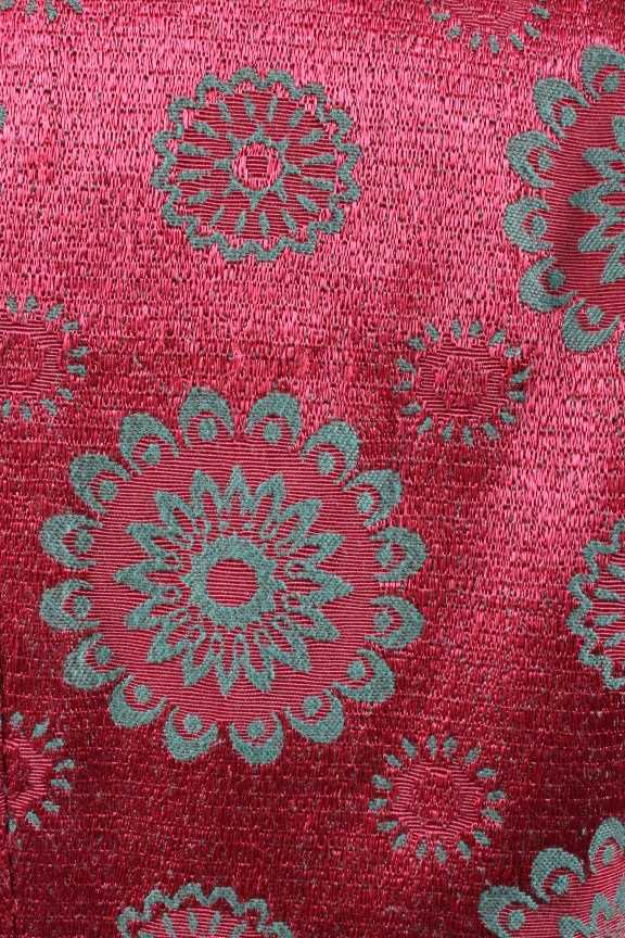Lot 41 - A John Stephen red damask satin double