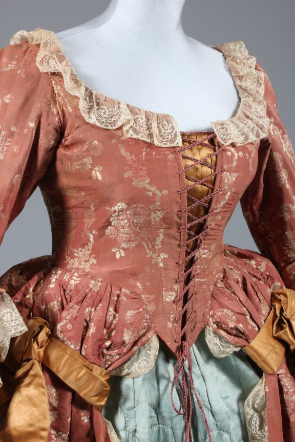 Lot 26 - A brocaded silk open robe and petticoat,