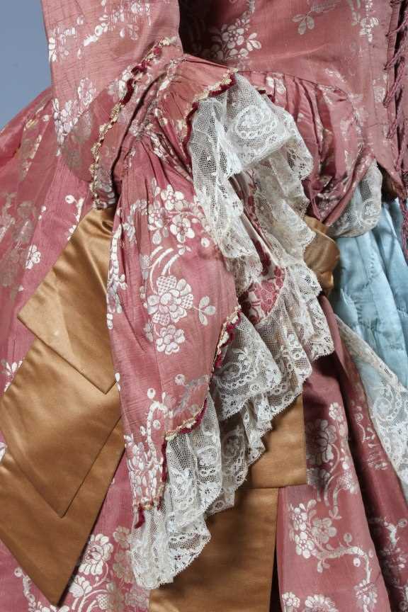 Lot 26 - A brocaded silk open robe and petticoat,
