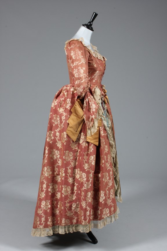 Lot 26 - A brocaded silk open robe and petticoat,