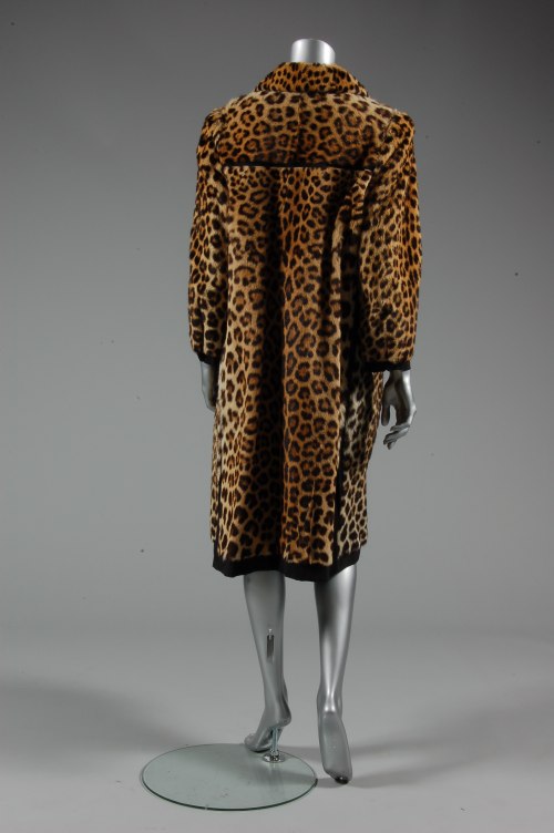 Lot 178 - A leopard skin coat, circa 1965, with black