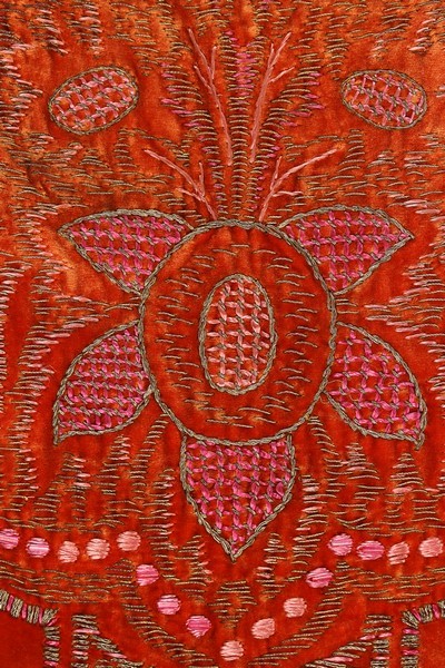 Lot 57 - An embroidered brick-red velvet couture