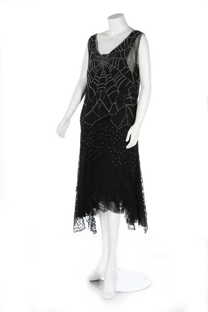 Lot 229 - A rare beaded chiffon 'Cobweb' flapper dress,