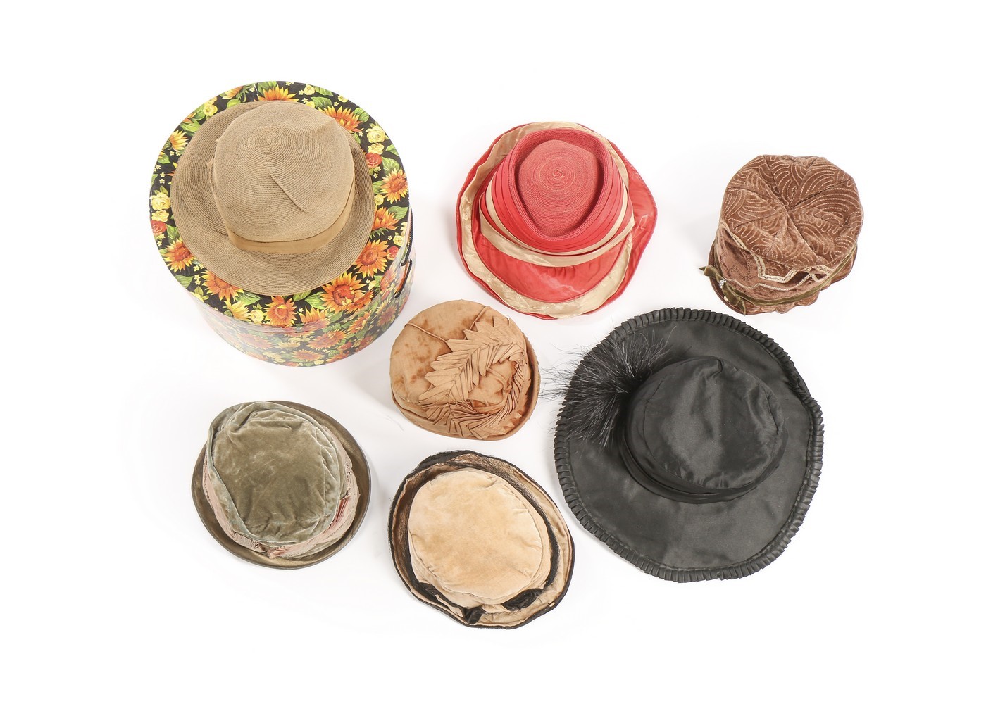Lot 196 - Seven hats, early-late 1920s, three cloche