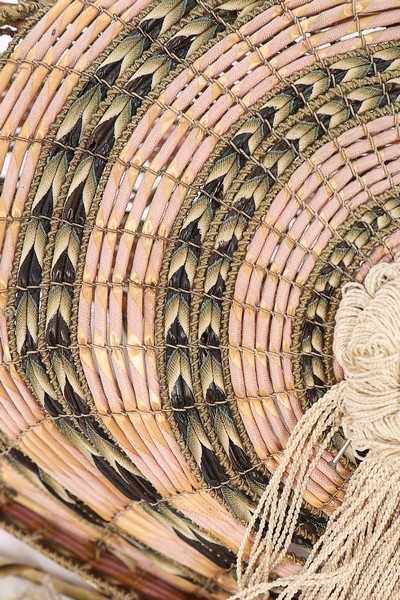 Lot 75 - A plaited ribbon and straw quill-work