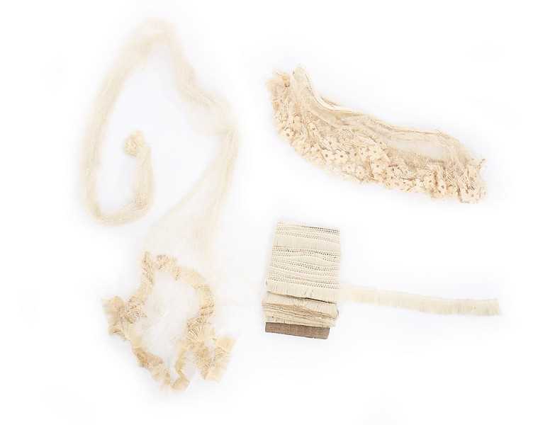 Lot 75 - A plaited ribbon and straw quill-work