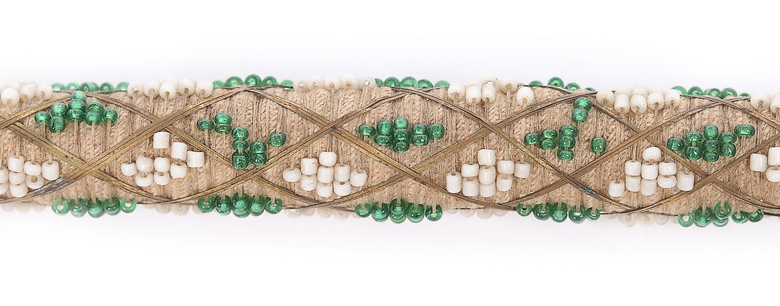 Lot 91 - A finely beaded riding crop, early 19th