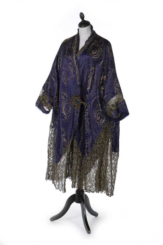 Lot 396 - A good ink-blue silk lamé opera coat,