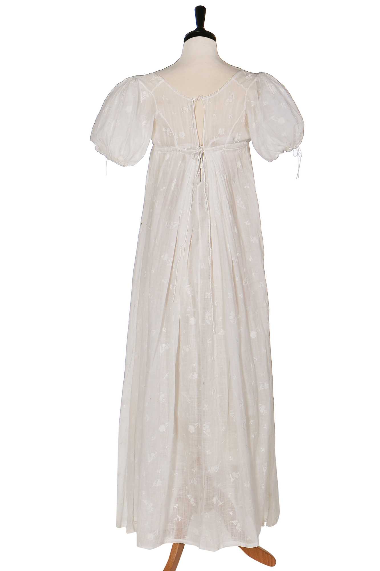 Lot 379 - An embroidered muslin dress circa 1810,