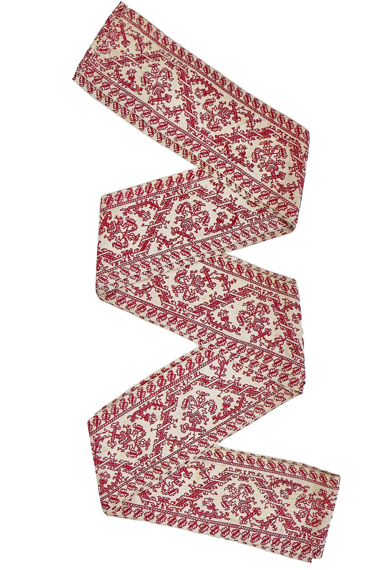 Lot 387 - A long embroidered redwork border panel,