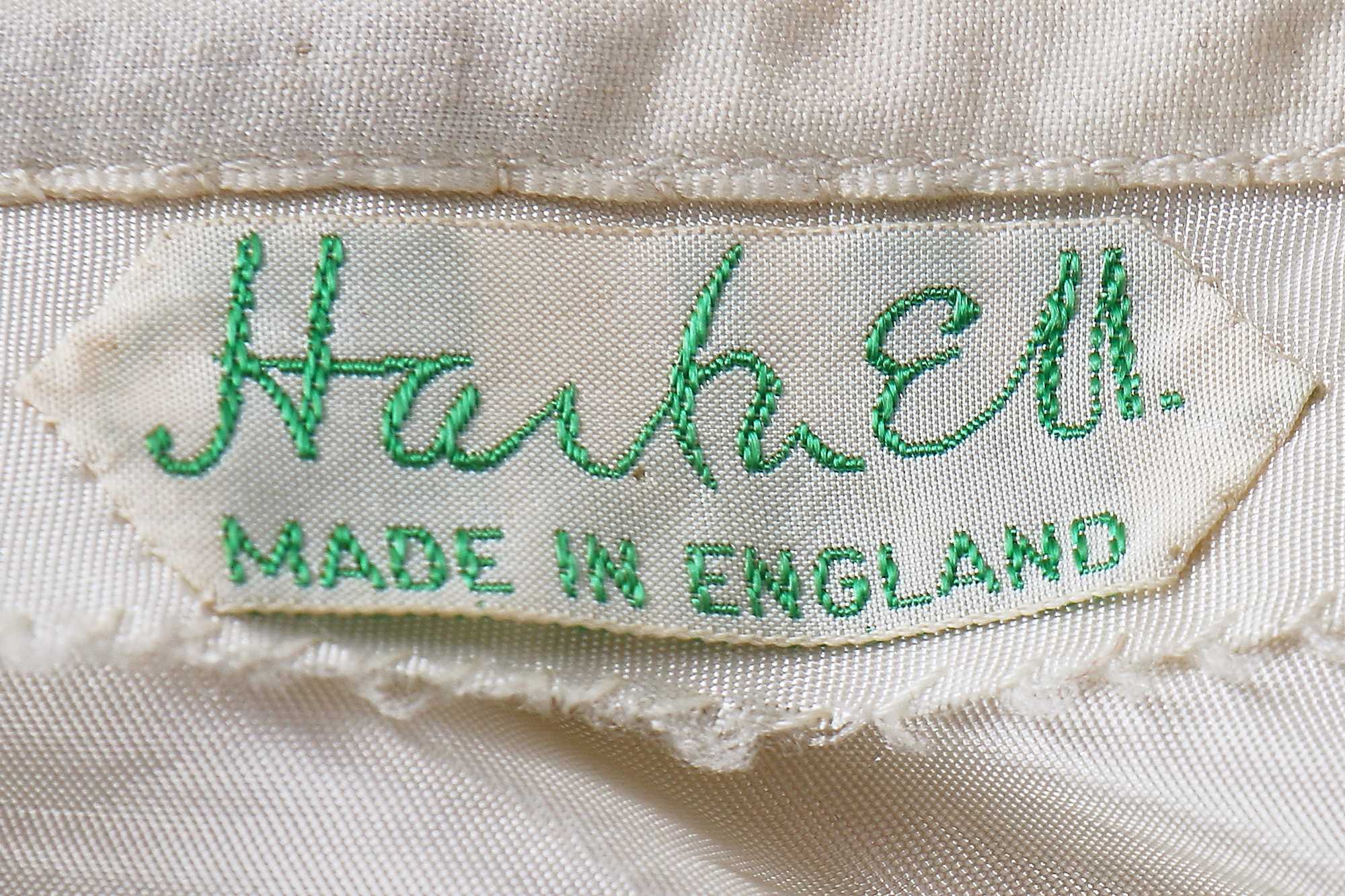 Lot 97 - A good Norman Hartnell couture satin bridal